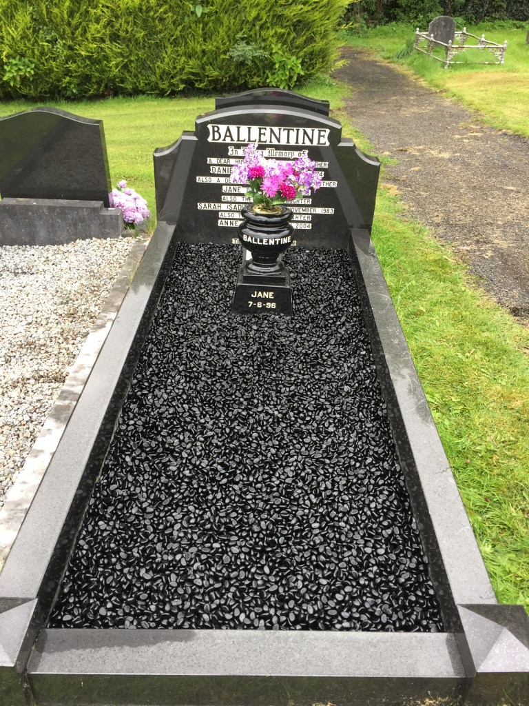 New black grave pebbles. – Ronnie Russell Ltd